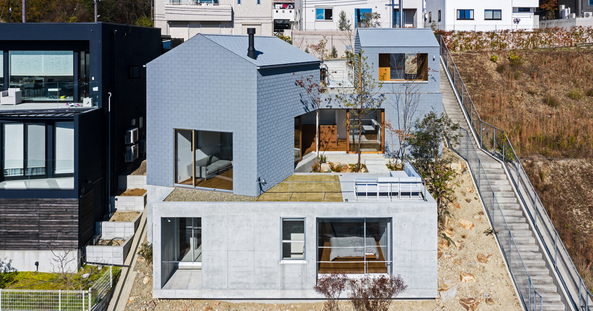 geo-graphic design lab stacks huts on a slope for family residence in ...