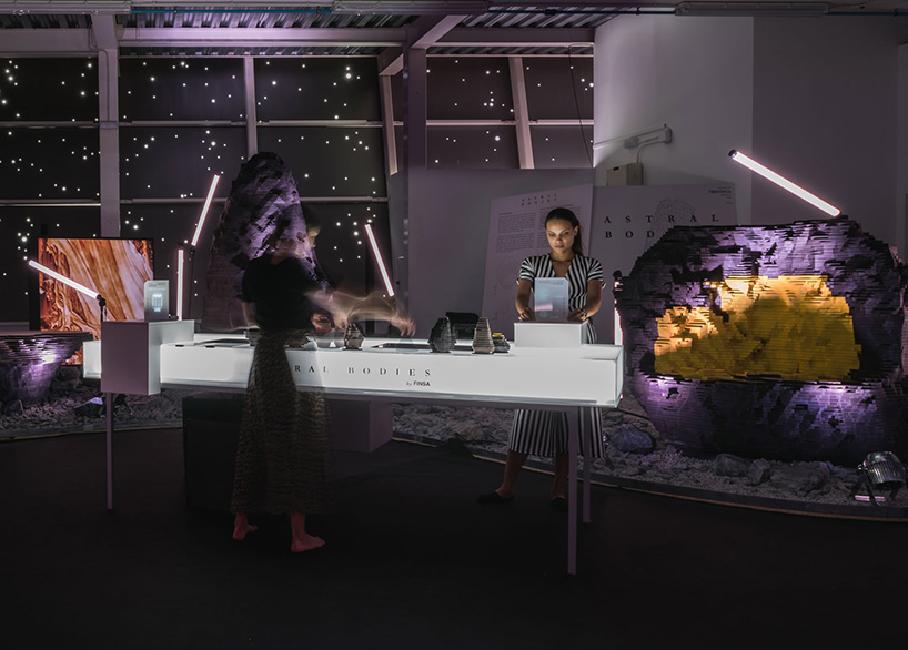ENORME studio designs an outer space exhibition featuring 'astral bodies'