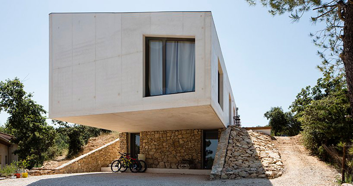 pan architecture adds a geometric family residence to rolling french fields