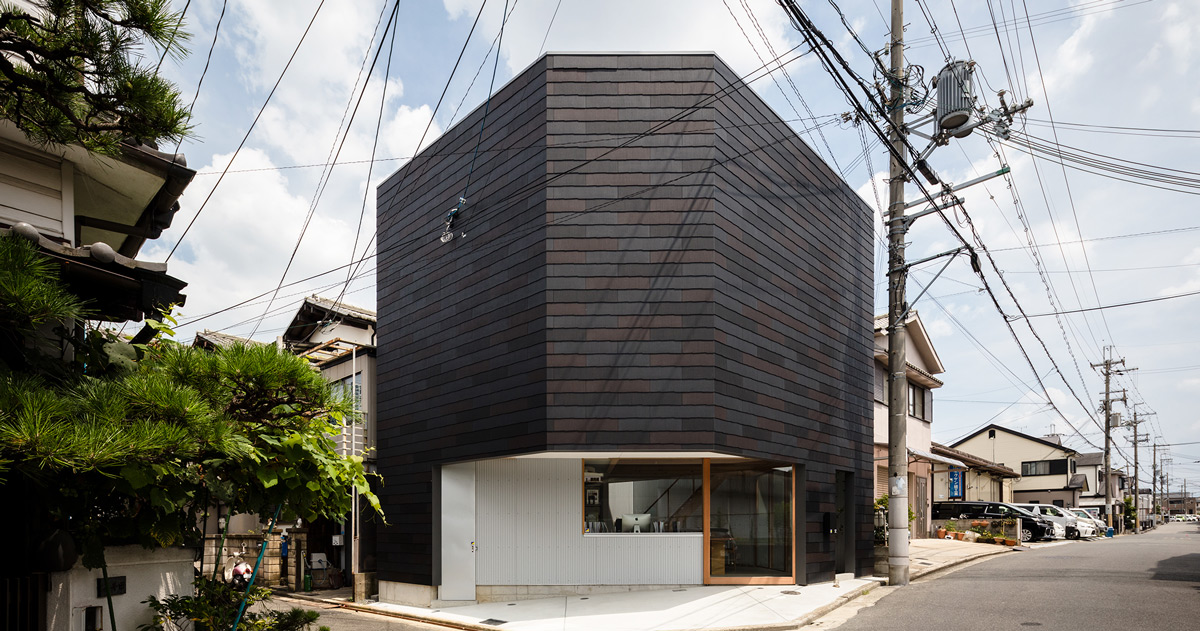 satoshi saito encloses 'house in sakai' behind tall fireproof walls