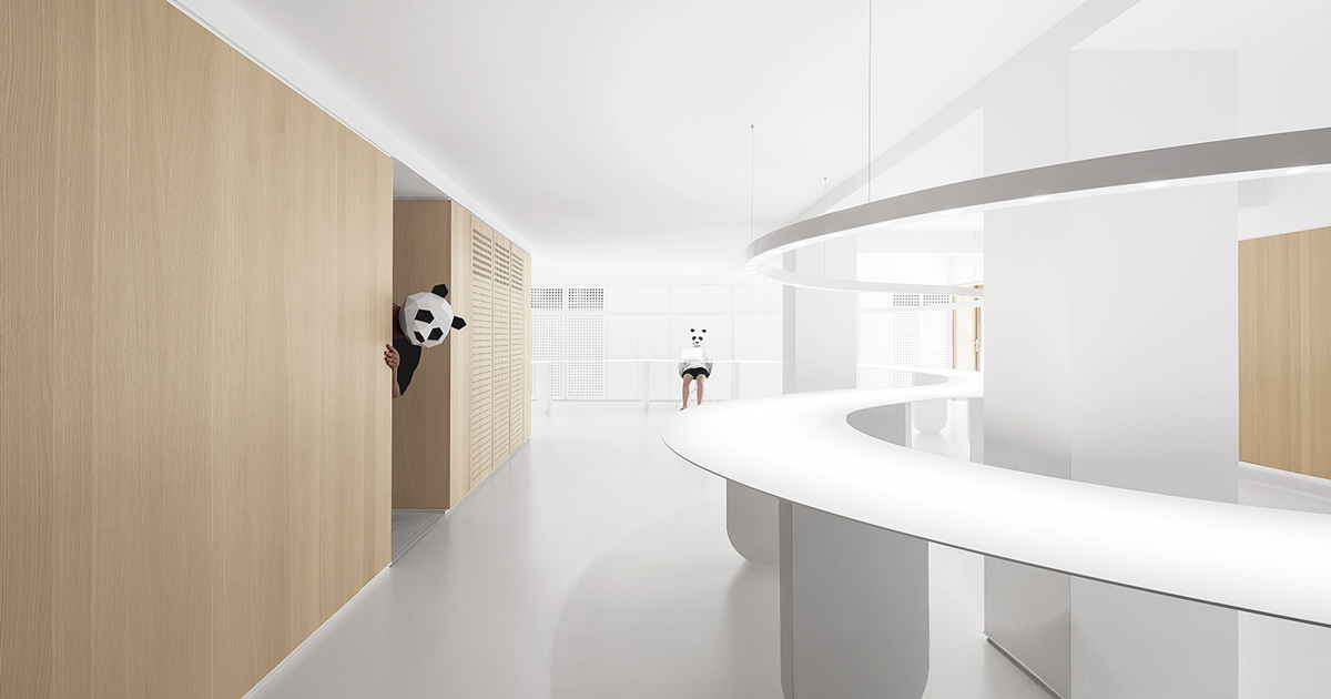panda design builds a new office around a curved workspace in xiamen