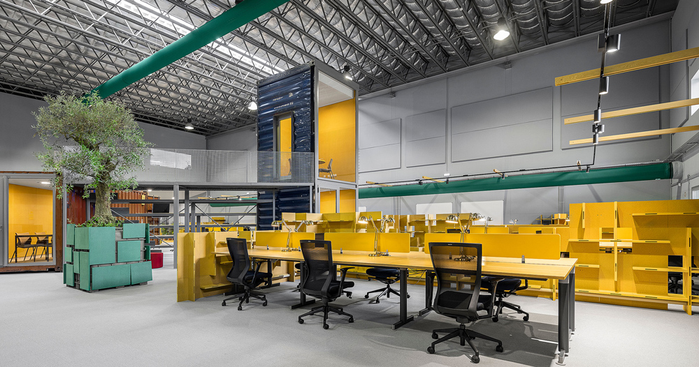 studium occupies warehouse in porto with 'spectris' creative workspace