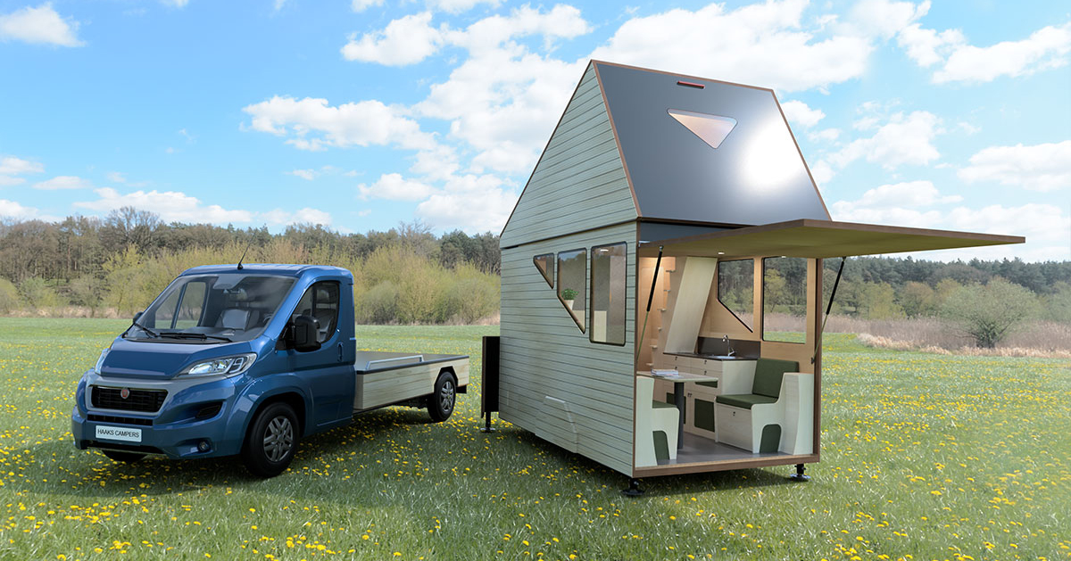 the haaks expandable camper pops-up to reveal a tiny two storey house