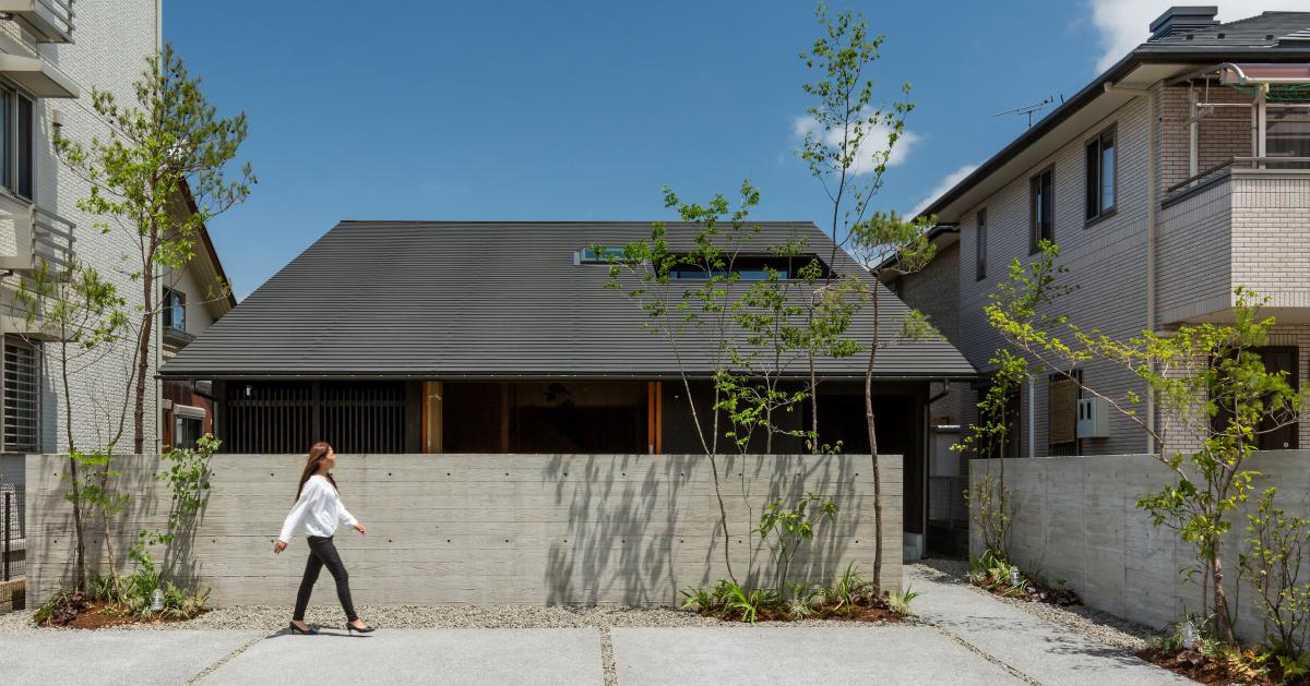 gabled roof with extended eaves tops hearth architects' hikone house in ...