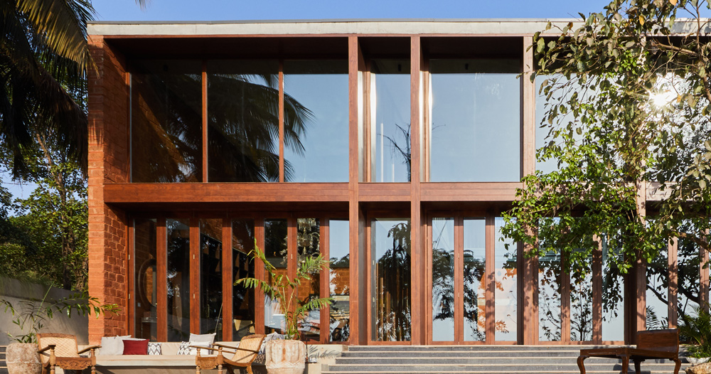 sP+a builds 'house of multiple courts' using laterite stone blocks