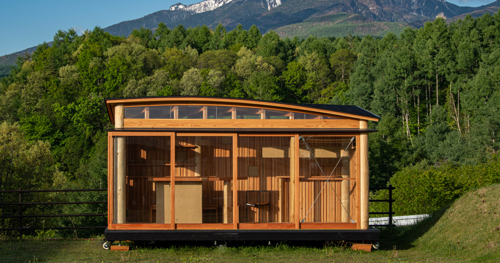 tono mirai's 'red container' is a micro dwelling made from larch