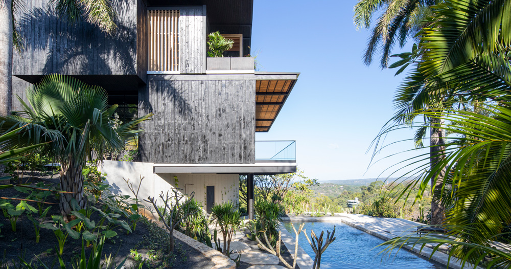 studio saxe clads 'tres amores' house in costa rica with timber façades