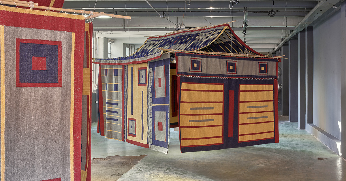 michele de lucchi presents 'many hands make one' carpet houses