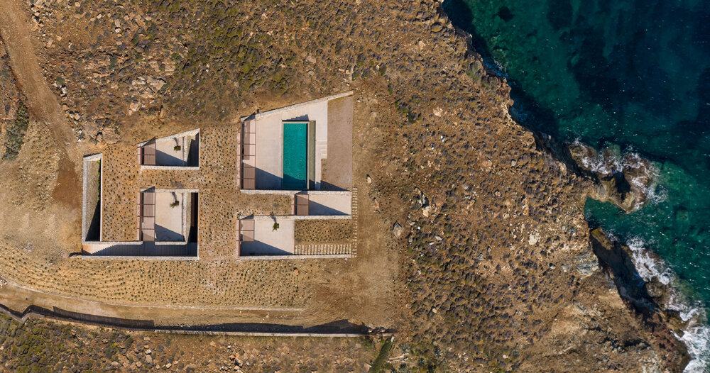 mold architects embeds its nCAVED house into the island cliffs of greece