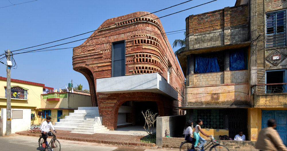 abin design studio mixes ceramics and brickwork with its gallery house