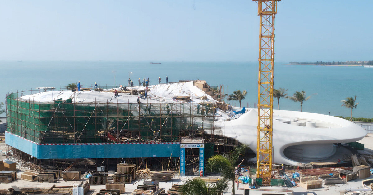 MAD architects' 'wormhole library' nears completion in haikou, china