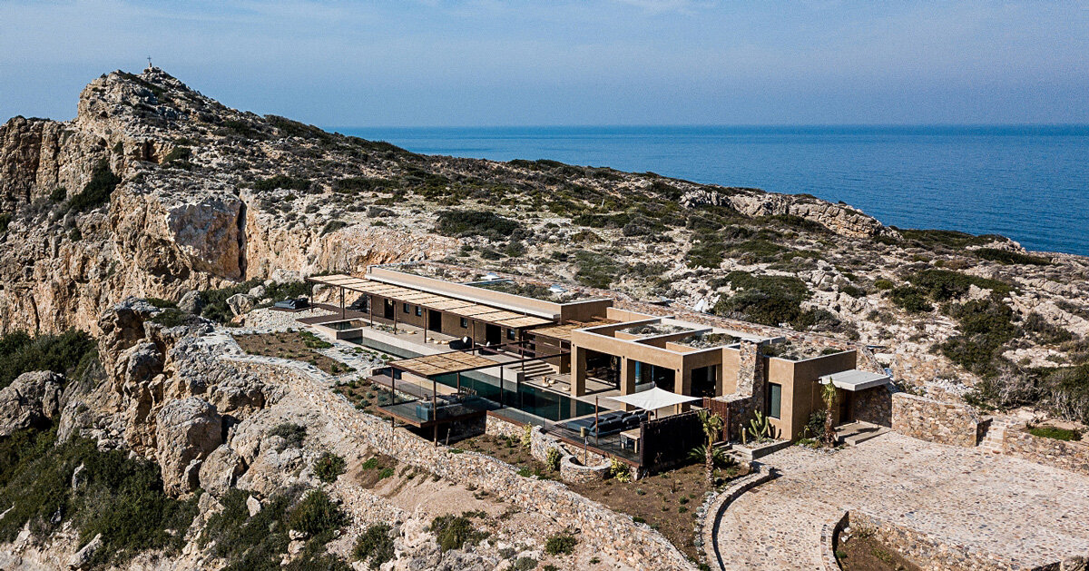 paly architects sets holiday residence on a steep rocky slope in crete ...