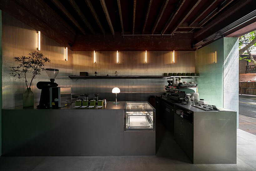 20 sqm 'slab town café' with strong contrasting textures settles in ...