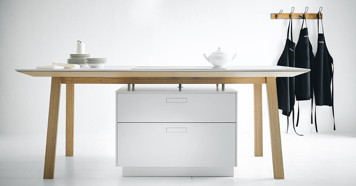next125 hides functional drawers underneath archetypal kitchen table
