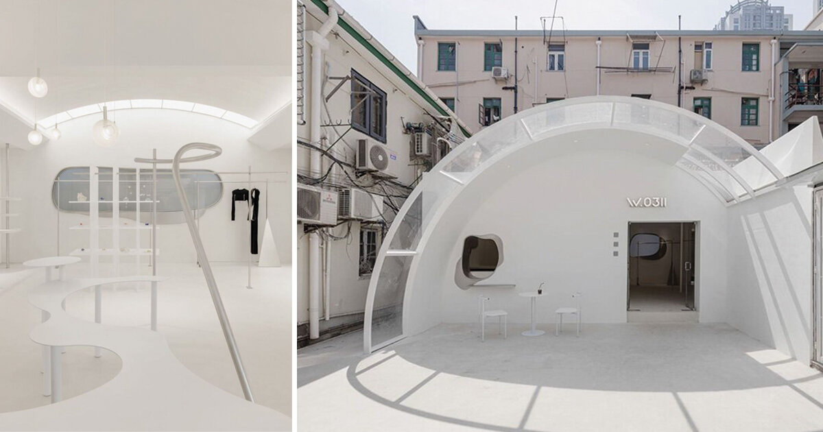 curvilinear display + minimal forms decorate this all-white clothing ...