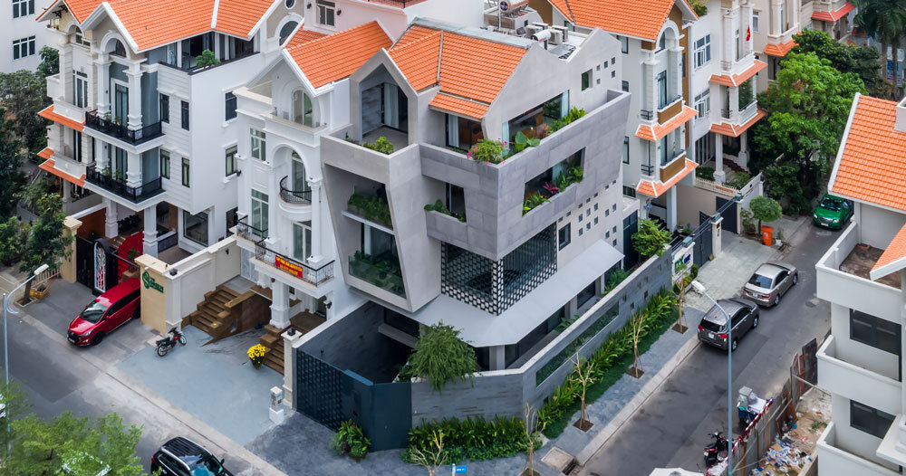 23o5studio interrupts a suburban block in vietnam with concrete J14 house