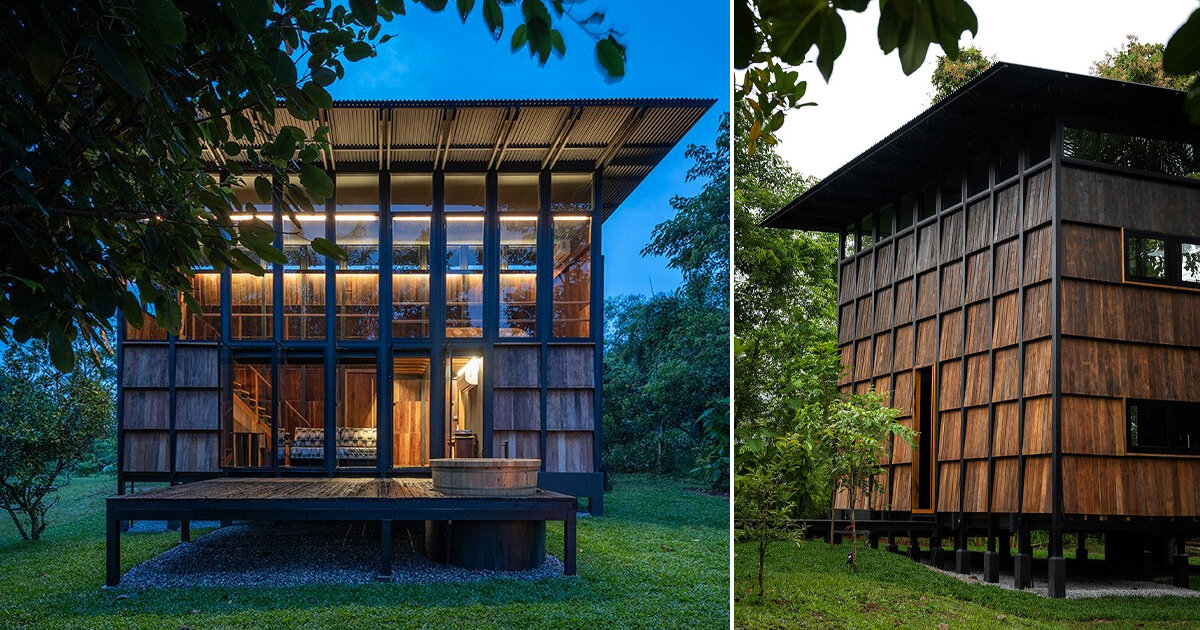 sher maker's charred wood cabin settles in serene landscape of thailand