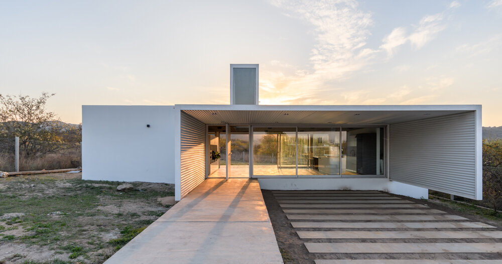 STC architects frames views across argentina with its house in la hornilla