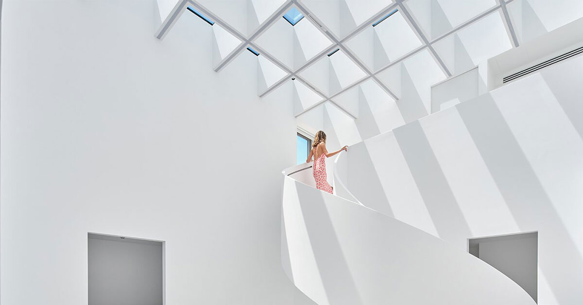 spiral staircase rises up the atrium within 'PH7800' residence in turkey