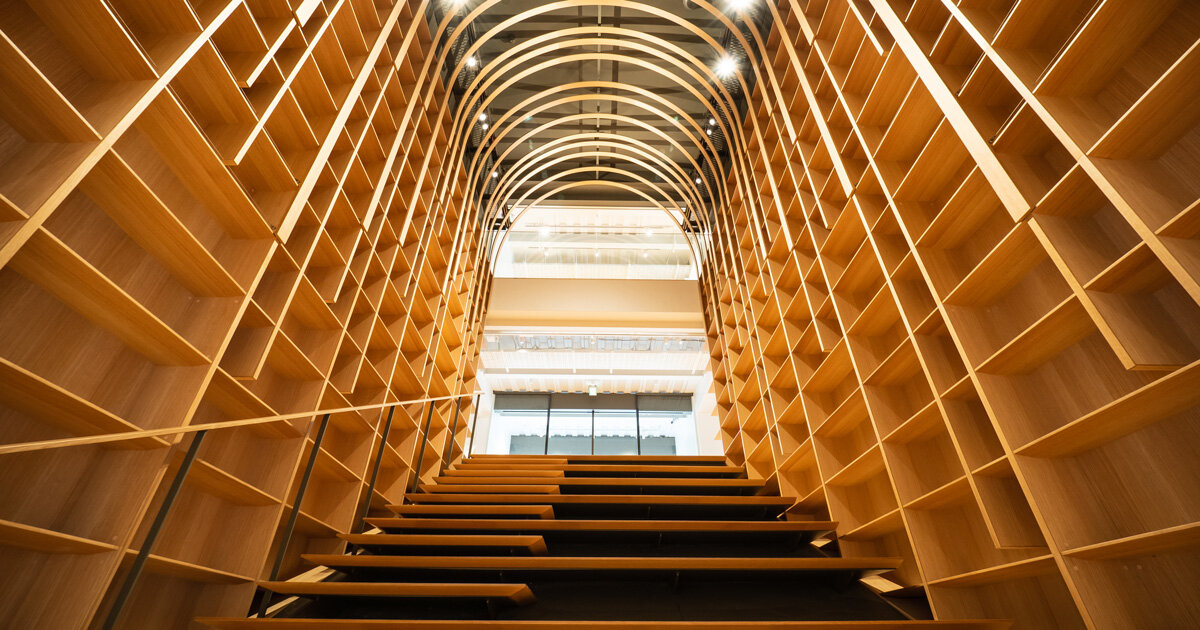 kengo kuma designs a wooden tunnel for the haruki murakami library