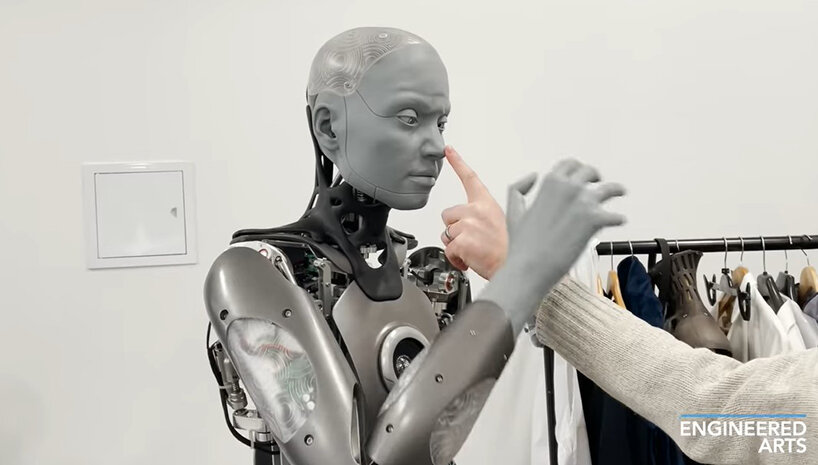 the humanoid robot 'ameca' reacts to a nose poke like a real person