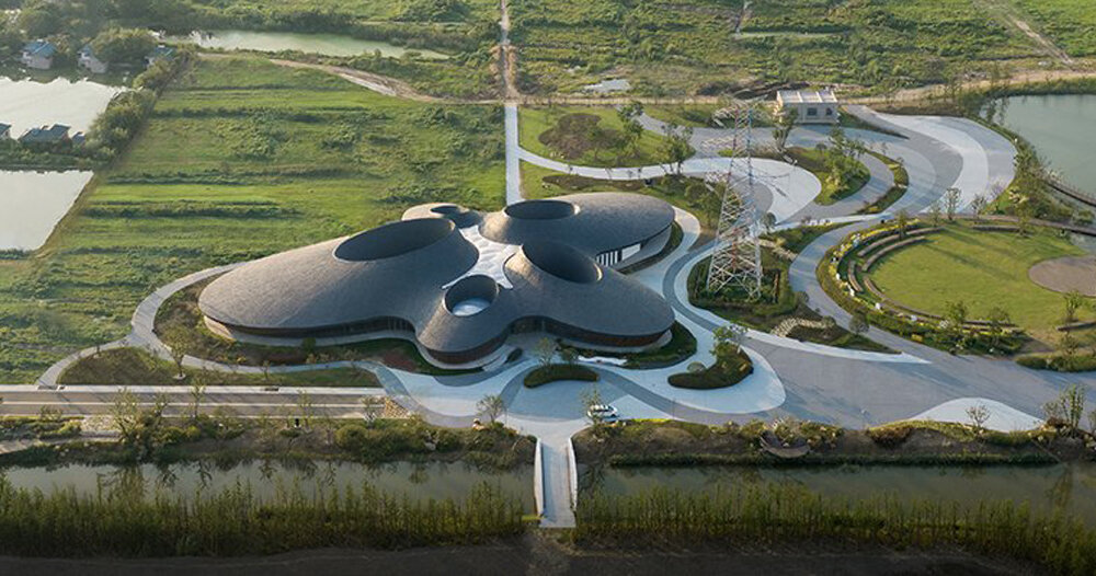 z-one architects clusters soft light-wells with luminous center in nantong