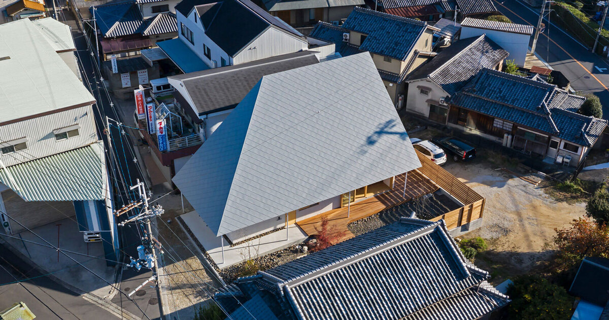 hamada design tops japanese house with rhombus-patterned galvalume roof