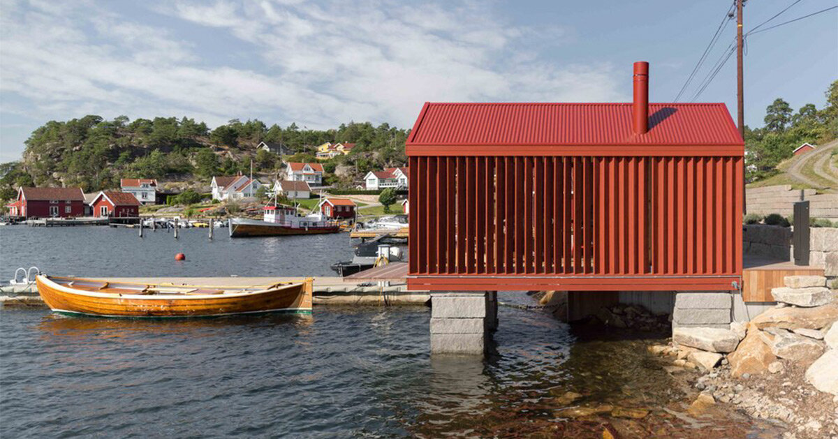 tiny red boathouse by handegård arkitektur settles in small norway harbor