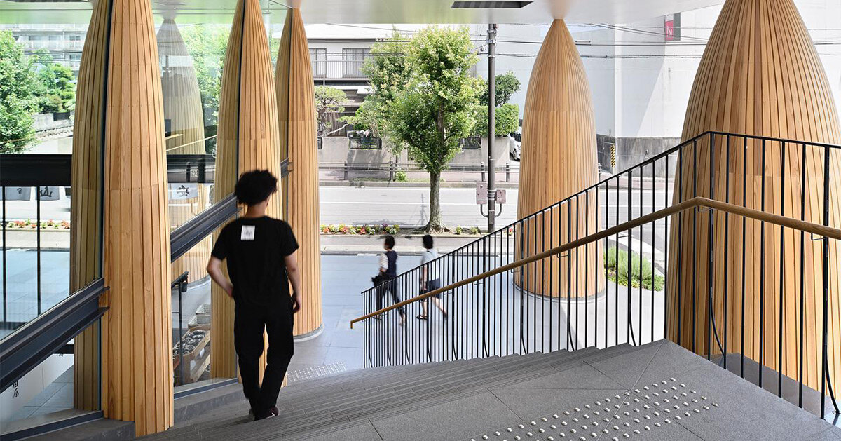 rhythmic arrangement of wooden pillars supports MAP's retail store in japan