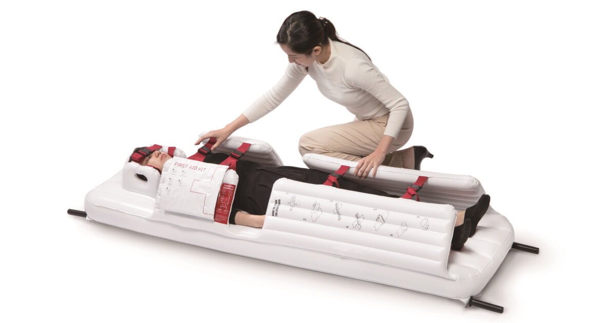 inflatable stretcher securely wraps patients in comfort and protects ...