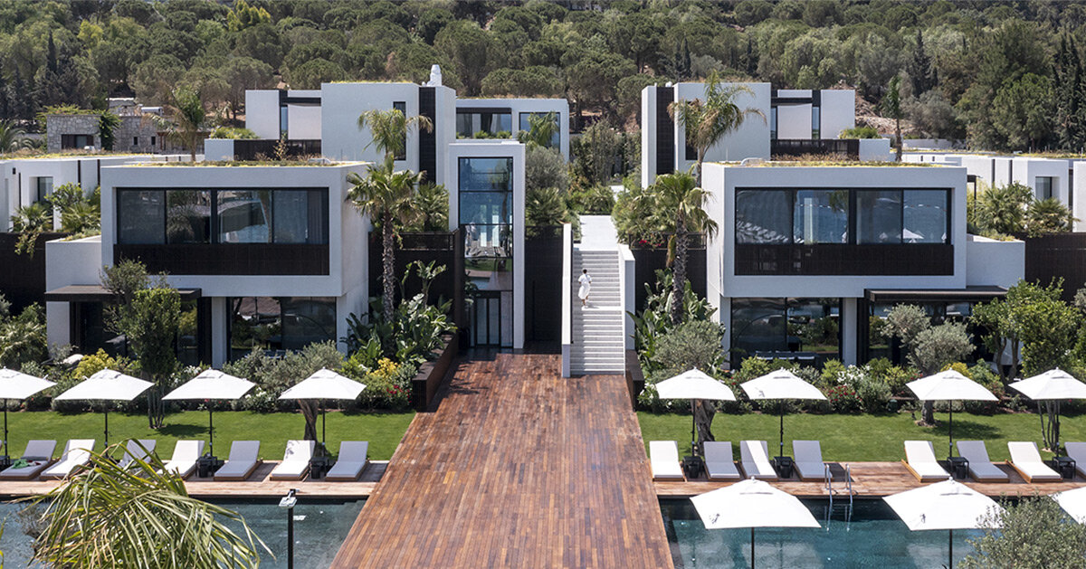 CAJA resort highlights scenic beach in turkey with arrangement of white ...