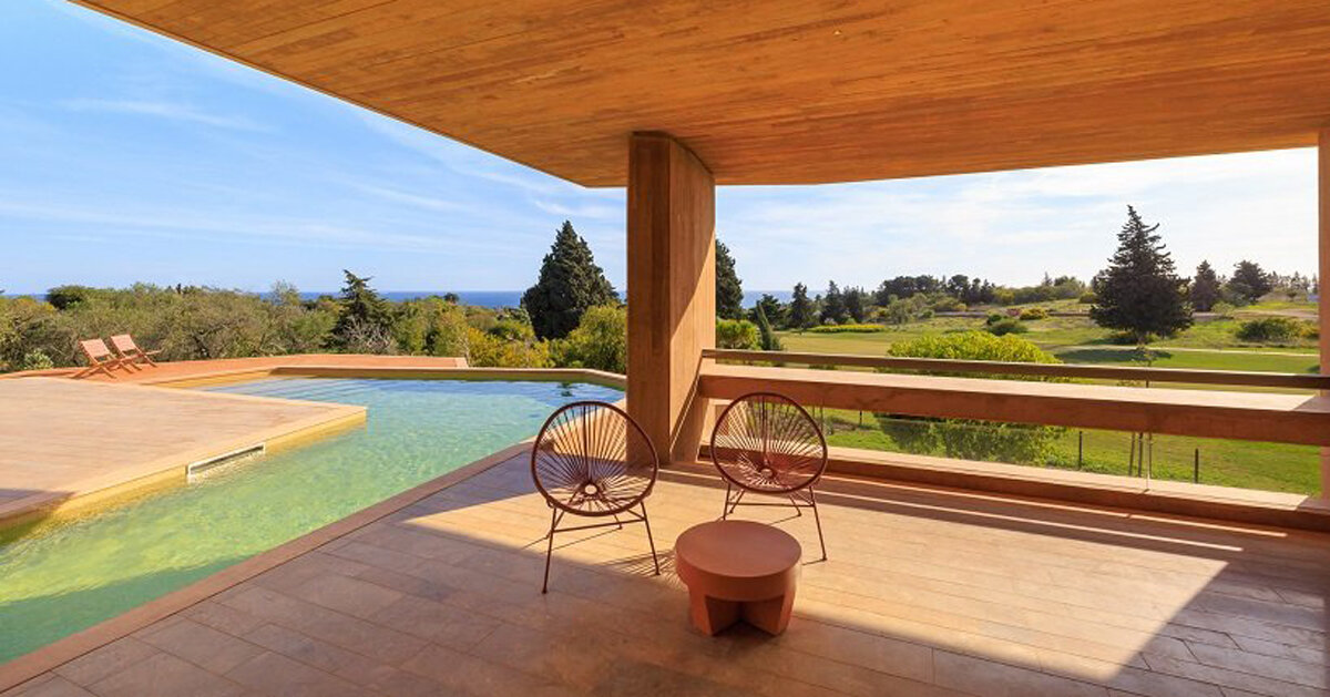 RCR arquitectes’ red concrete villa echoes the hues of the algarve