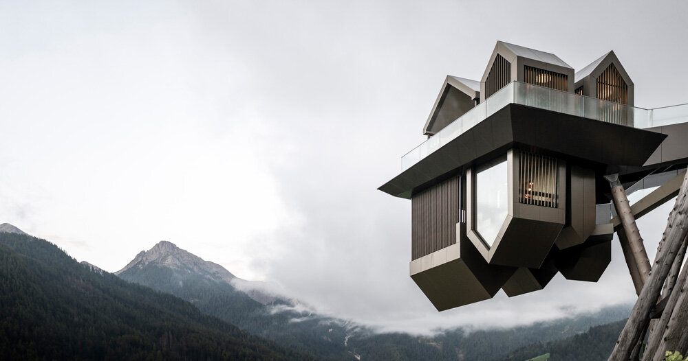 noa* defies gravity in the dolomites with inverted 'hub of huts' spa