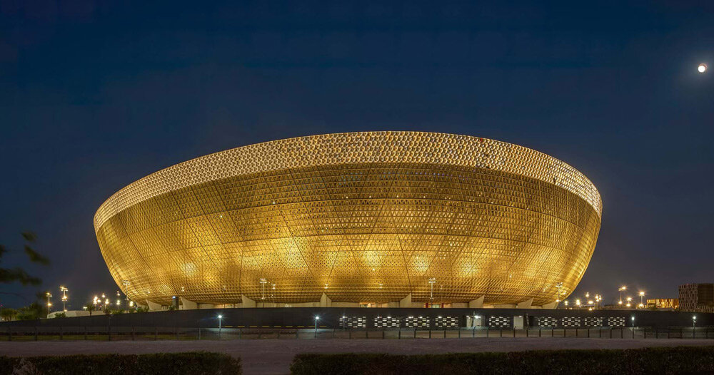 foster + partners' lusail stadium stands as a 'golden vessel' in qatar