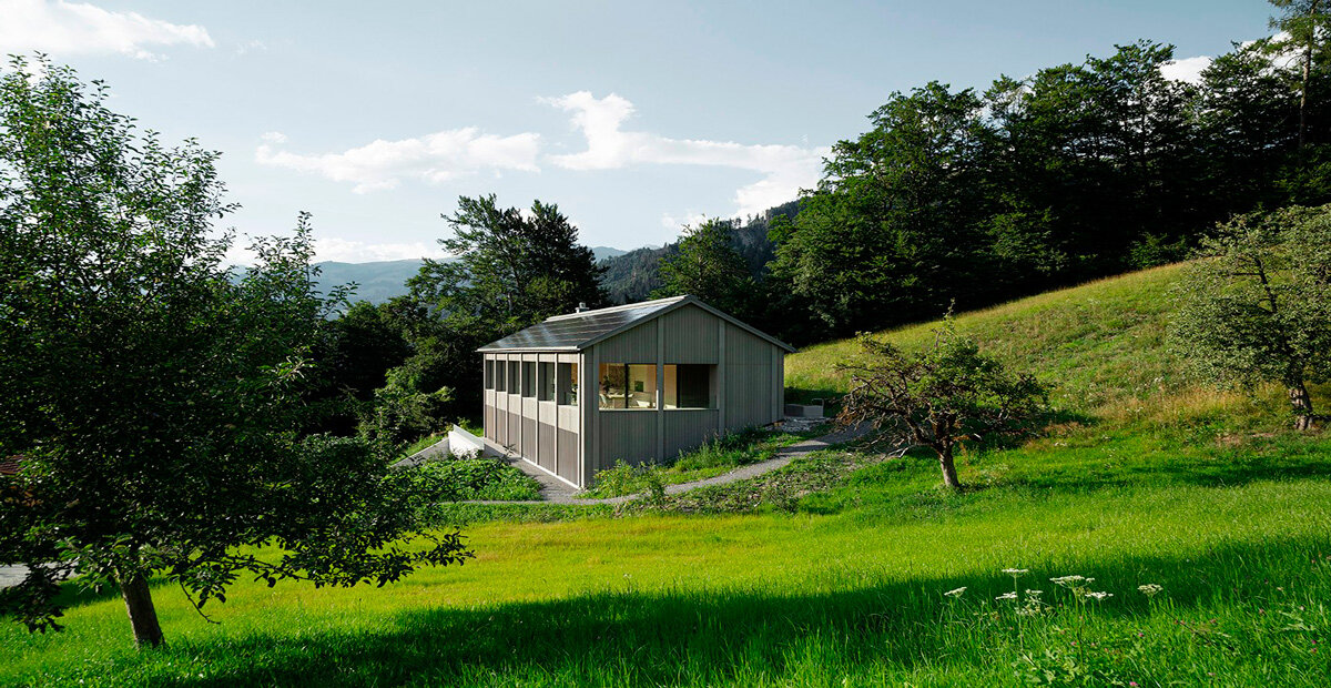 grey wooden framework shapes stable-like residence 'furgalleidis' in ...