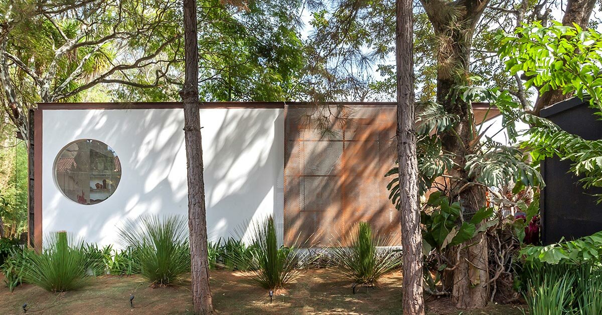perforated louvers in corten steel clad getaway cabin in brazil
