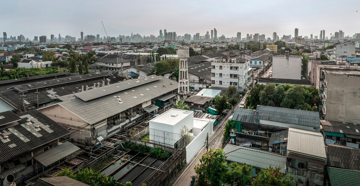 white dense geometric block enfolds private residence in bangkok