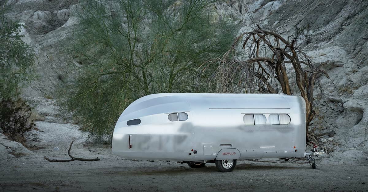bowlus clads bullet-shaped travel trailer in silver armor