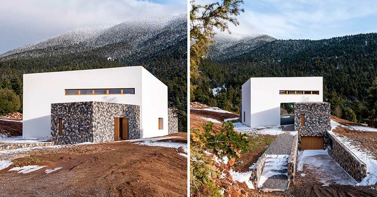 icy white volume overlays stone-built 'snowfall house' in greece