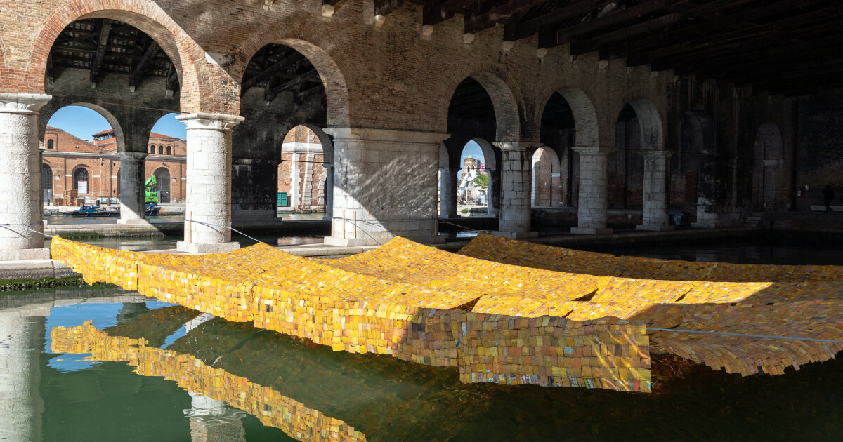 serge attukwei clottey hangs tapestry of plastic gallon containers at ...