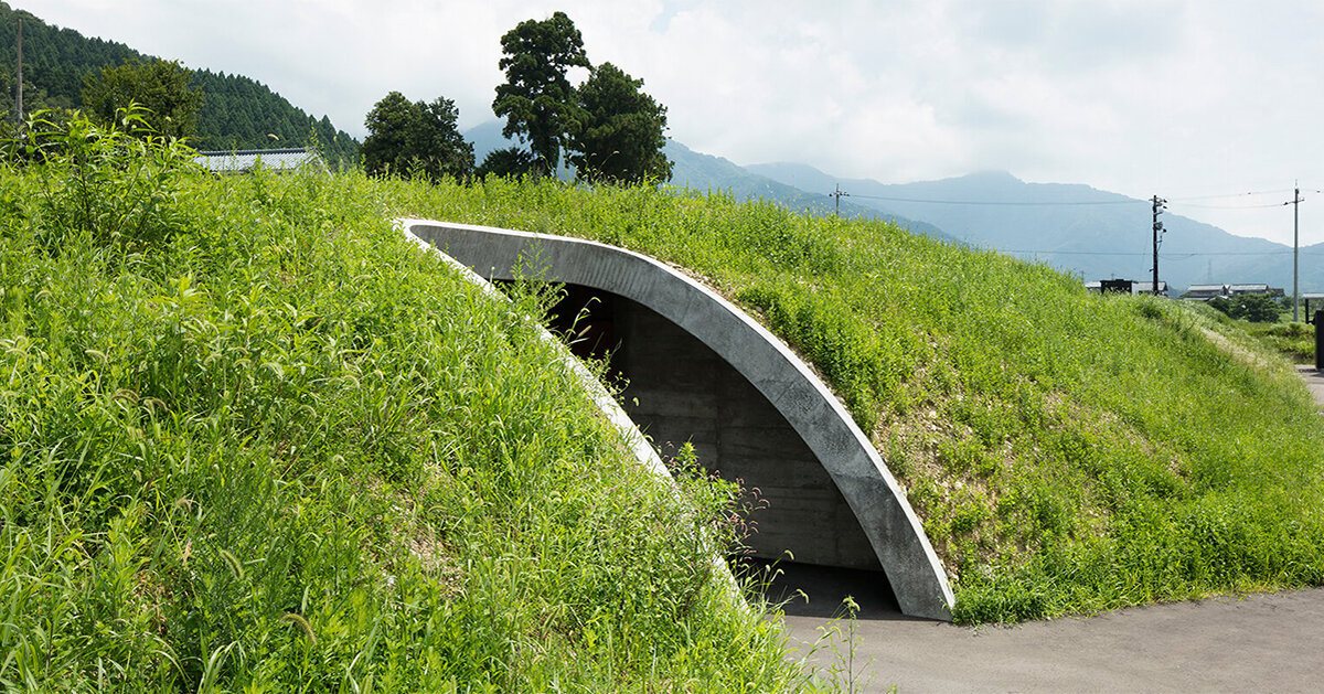 furuya design weaves underground sake brewery into the lush landscape ...