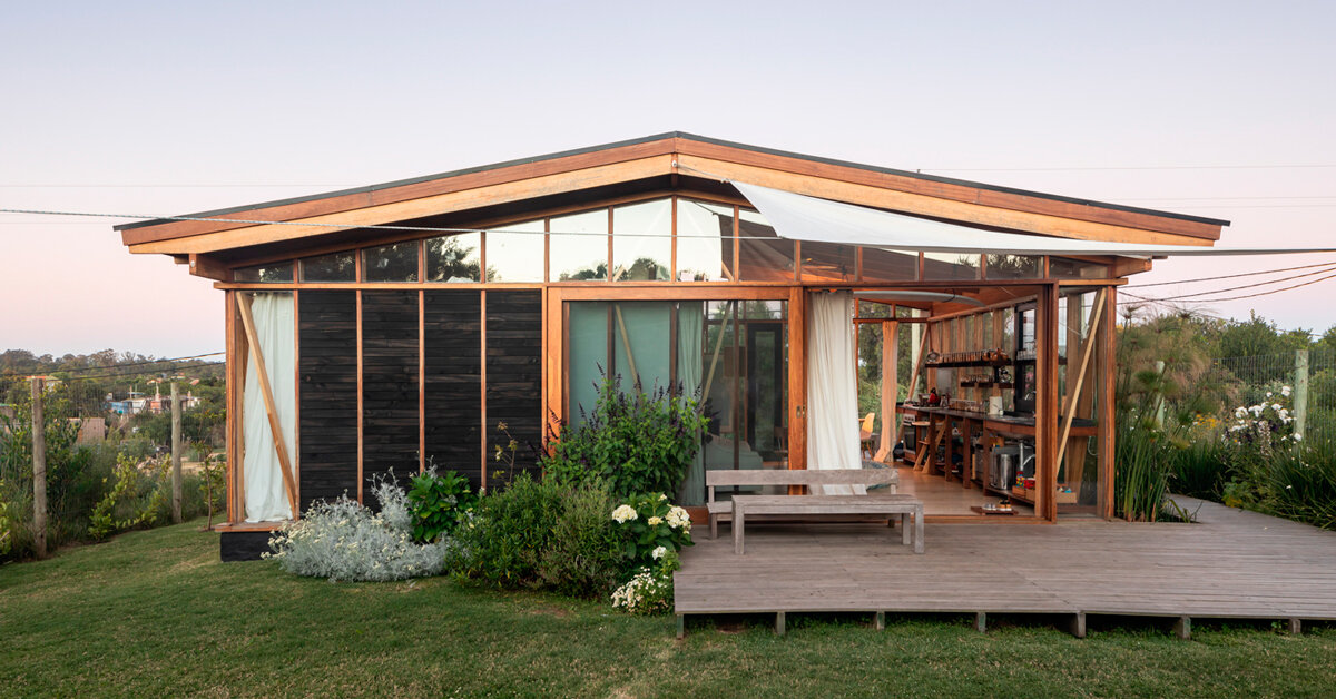 'transparent house' of glass and wood opens all facades