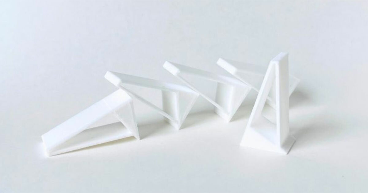 yuichiro morimoto's 3D-printed triangular domino tiles get up instead ...