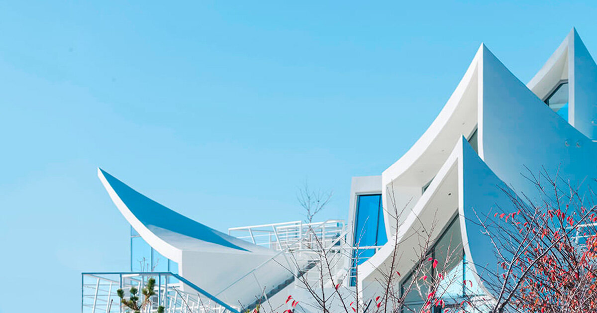 sharp edged white volumes compose IROJE KHM's sailing house in south korea