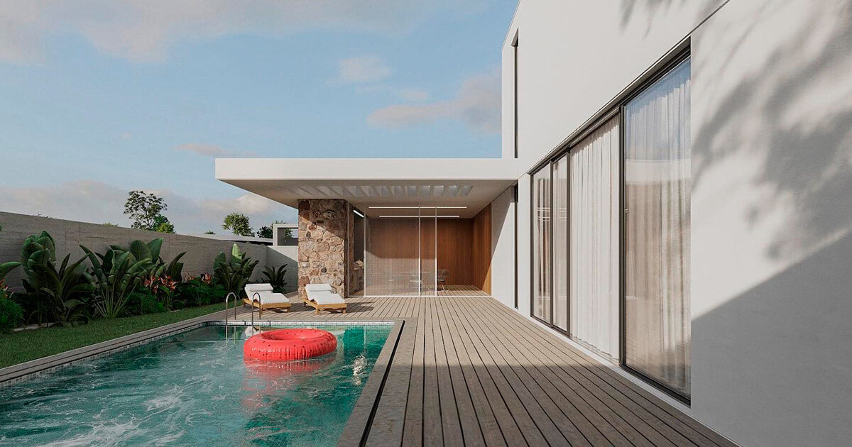 white cantilever glazed volume stands on stone plinth in cyprus