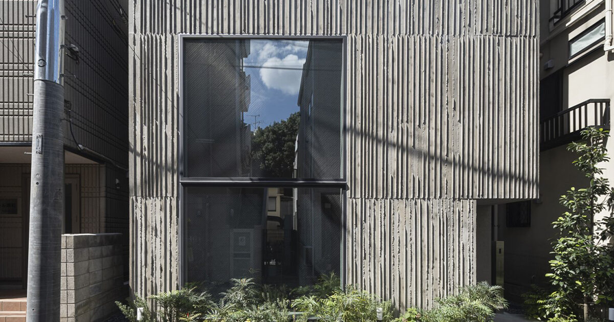 K+S architects fronts home-office with striated concrete texture