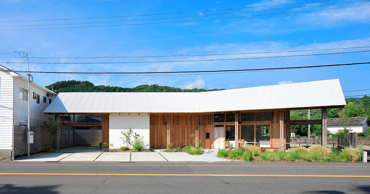 wooden pillars topped by an arched roof shape anandah café and residence