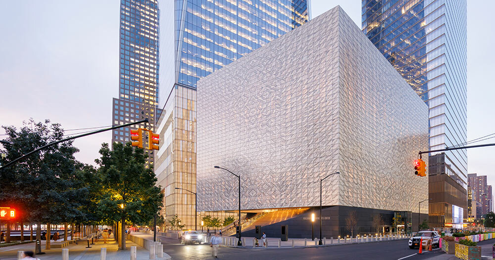 new york's perelman arts center shrouded in a luminous marble veil