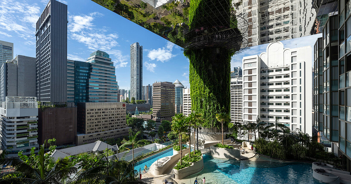 woha implants lush green terraces in high-rise hotel in singapore