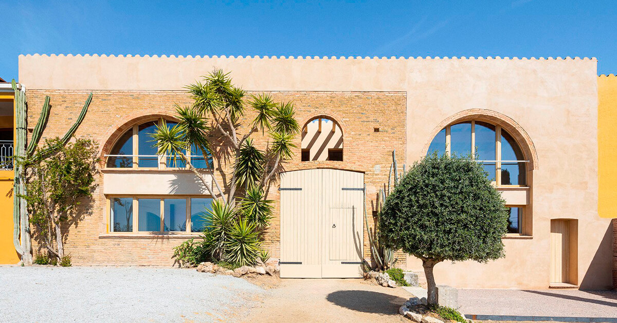 brick-clad sheep barn in spain transforms into family home